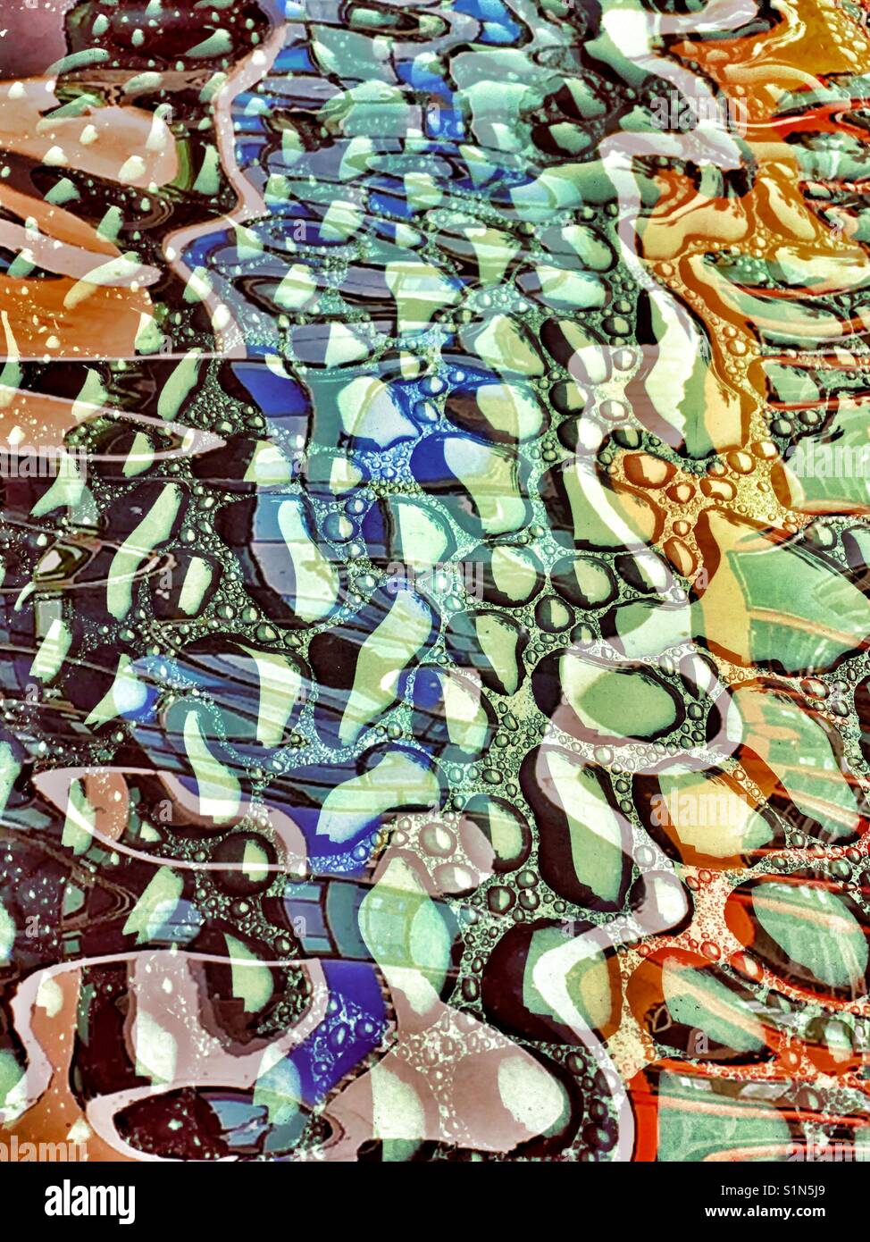 Colourful Reflections of Raindrops Stock Photo - Alamy