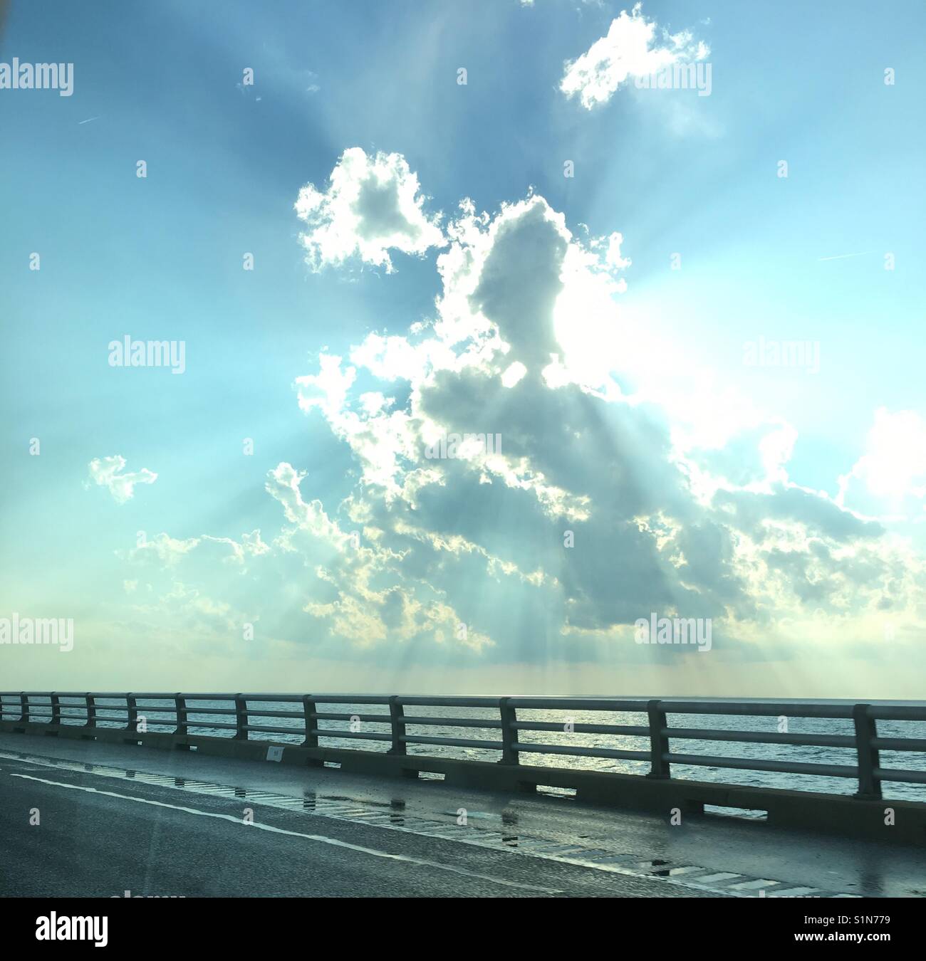 Sun rays clouds hi-res stock photography and images - Alamy