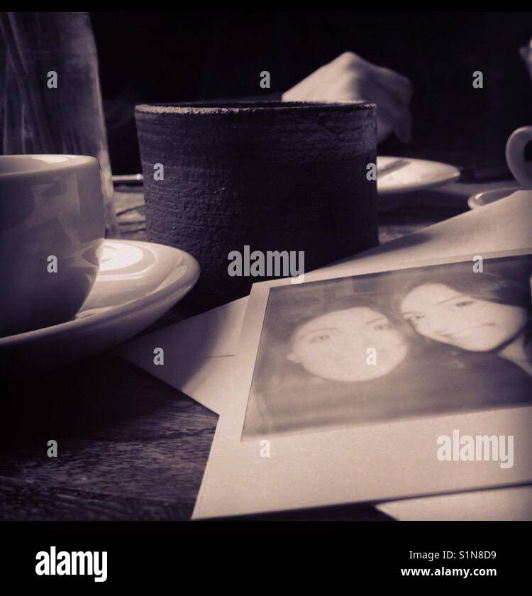 Messy table of a cafe in town, Brighton, England. Meeting up old dear ...