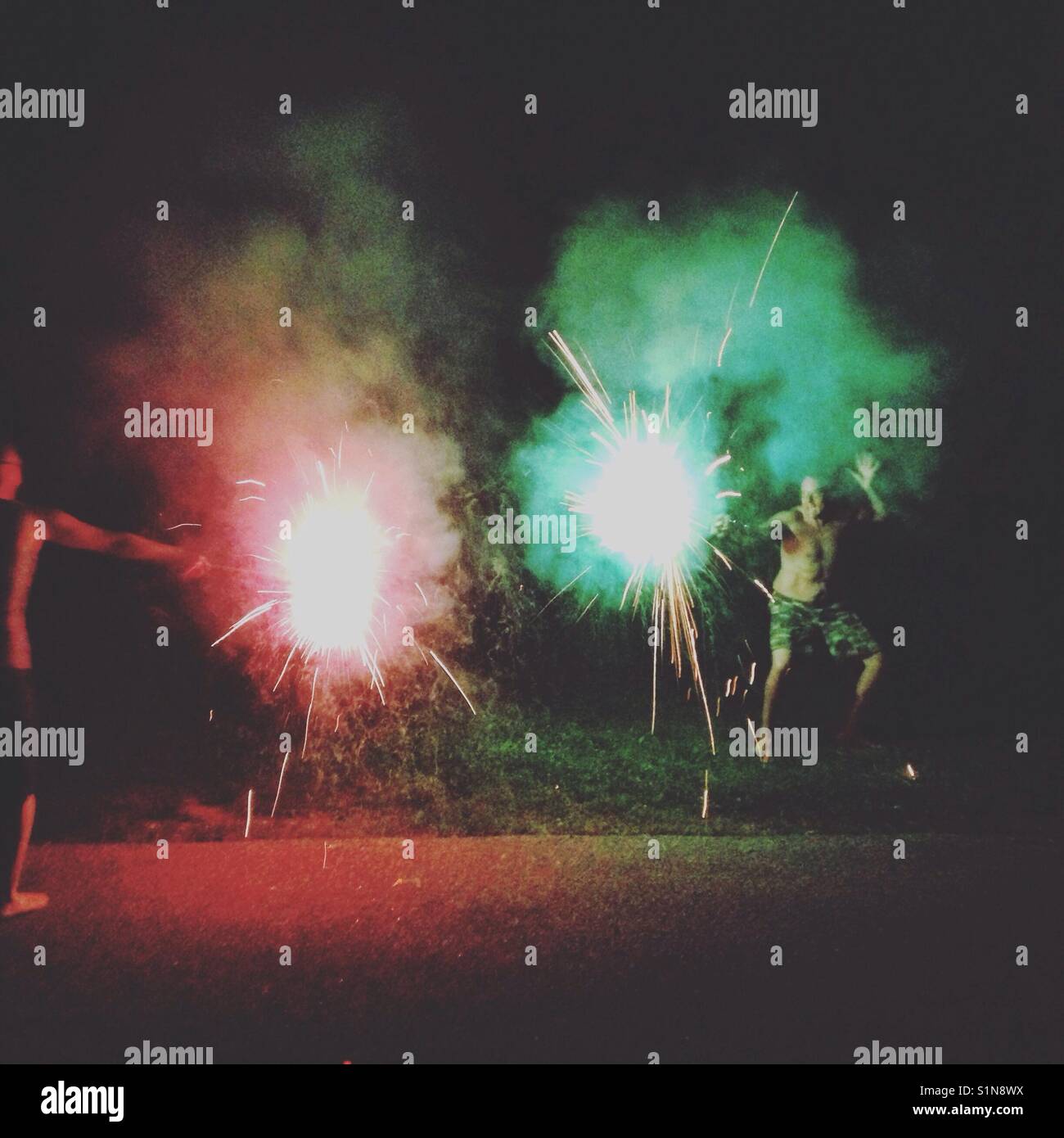 Red green fireworks hi-res stock photography and images - Alamy