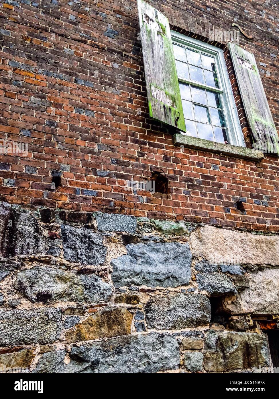Stonework and wooden shutter on historic Kerr Mill at Sloan Park ...