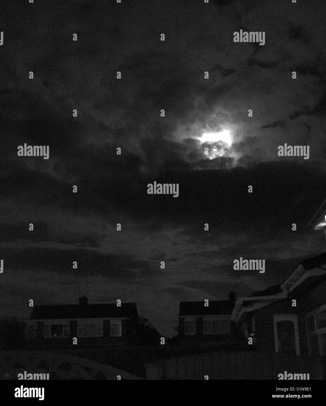 Full moon behind clouds night hi-res stock photography and images - Alamy