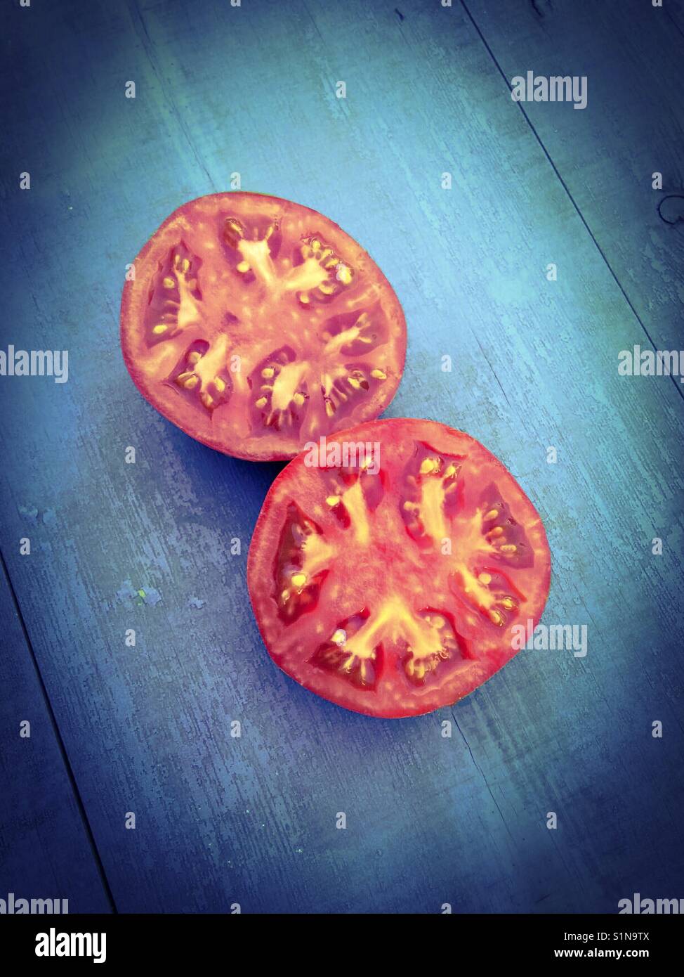 Halves of tomatoes hi-res stock photography and images - Alamy