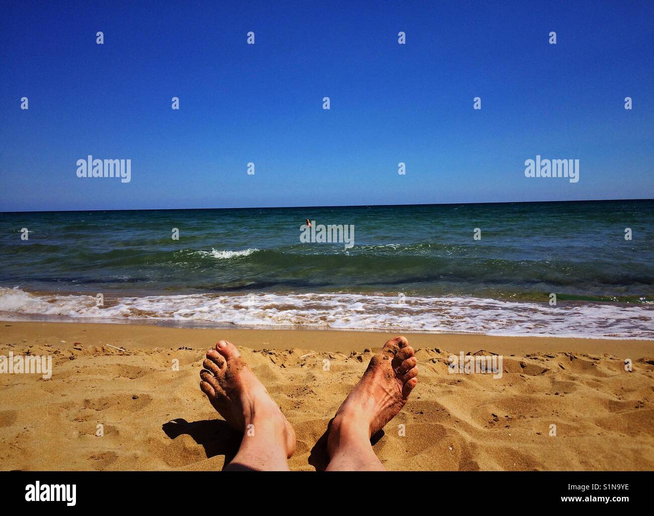 Feet on a beach Stock Photo - Alamy