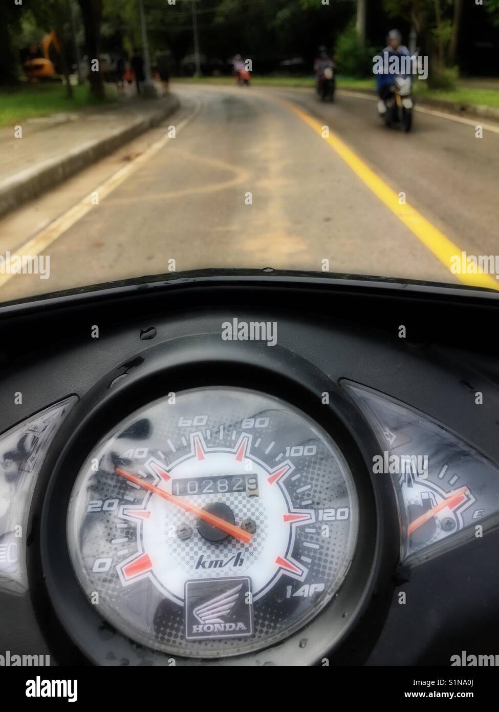 Motorbike on the road passing other motorcycles Stock Photo - Alamy