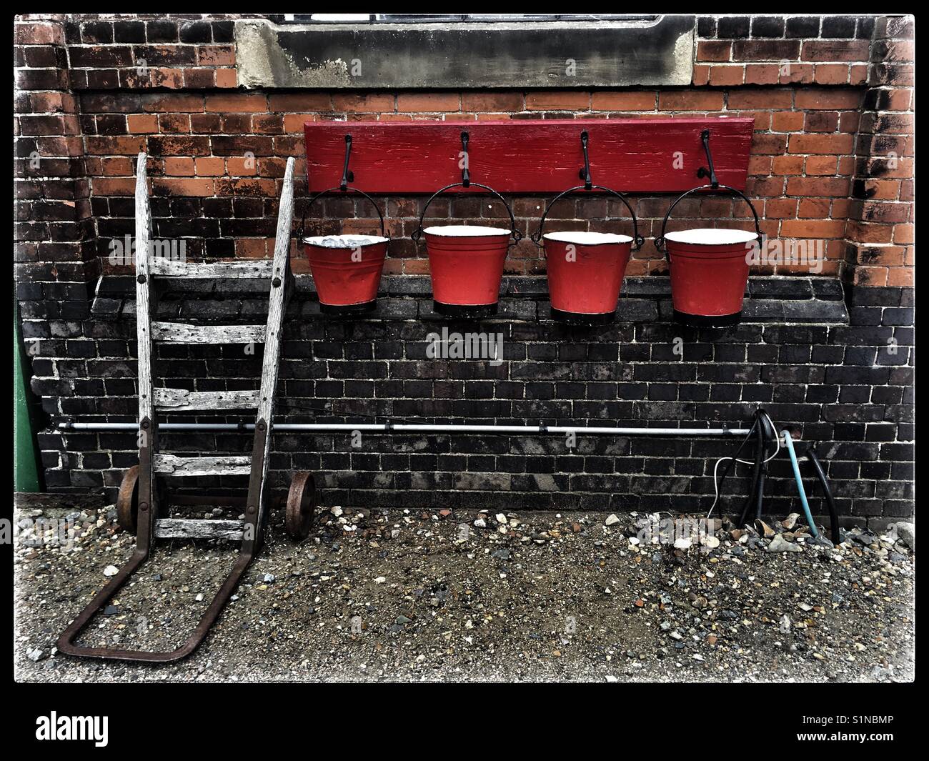 Vintage fire bucket Station Stock Photo - Alamy