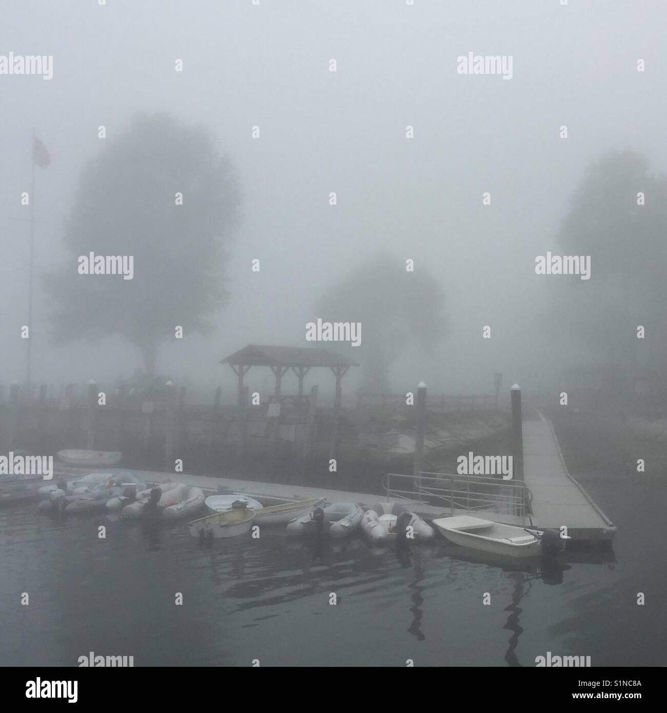 Fog on the water in Rockport, Maine Stock Photo - Alamy