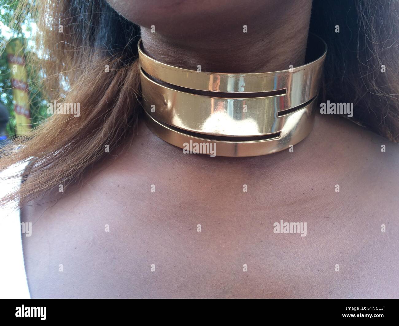 Big gold necklace hi-res stock photography and images - Alamy