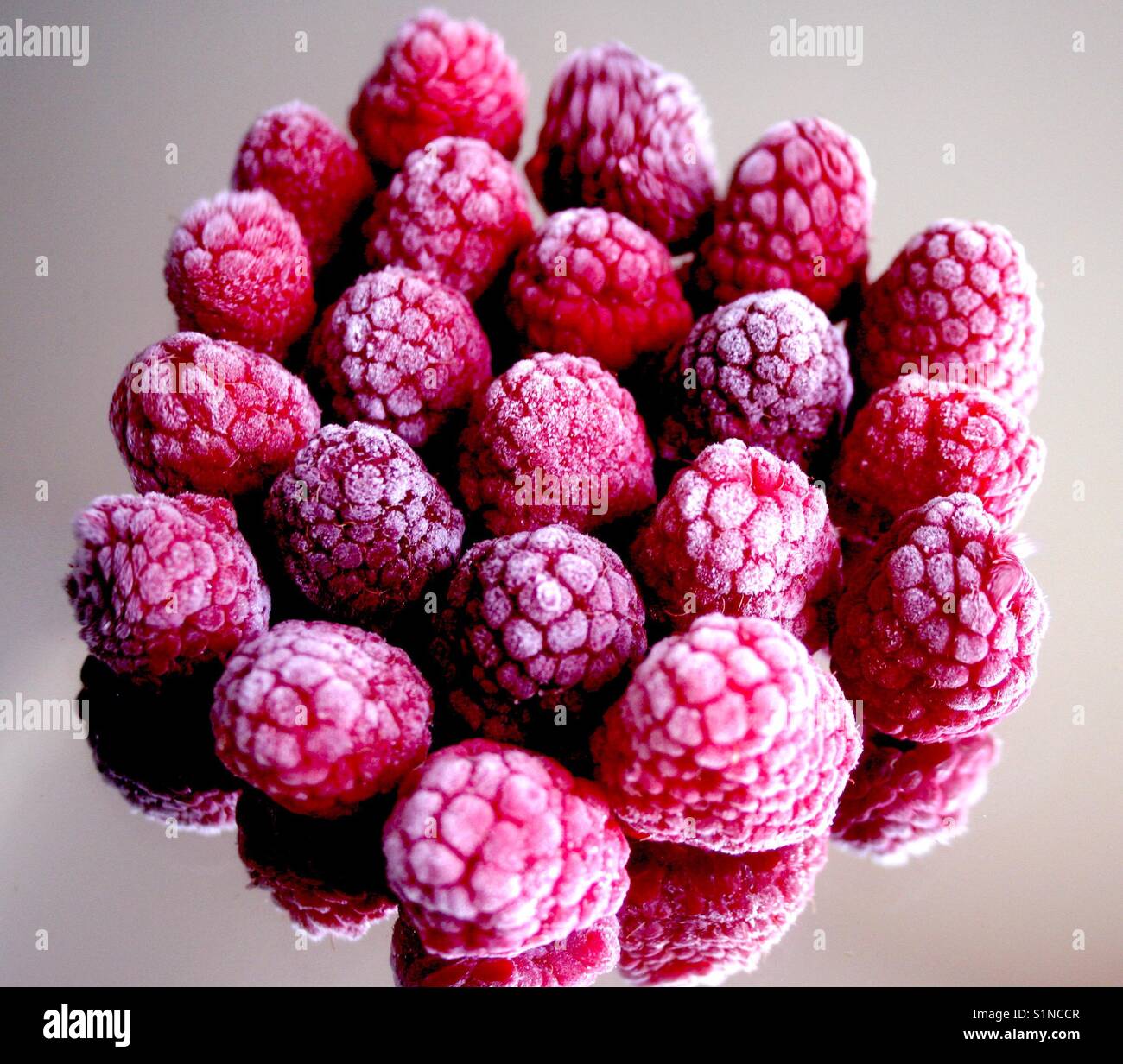 Frozen raspberries hi-res stock photography and images - Alamy