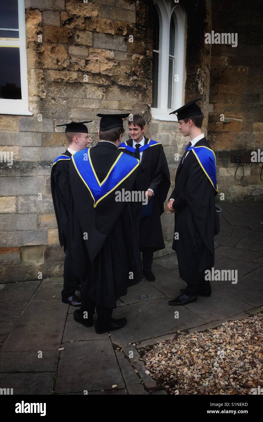 Graduates following graduation ceremony Stock Photo - Alamy