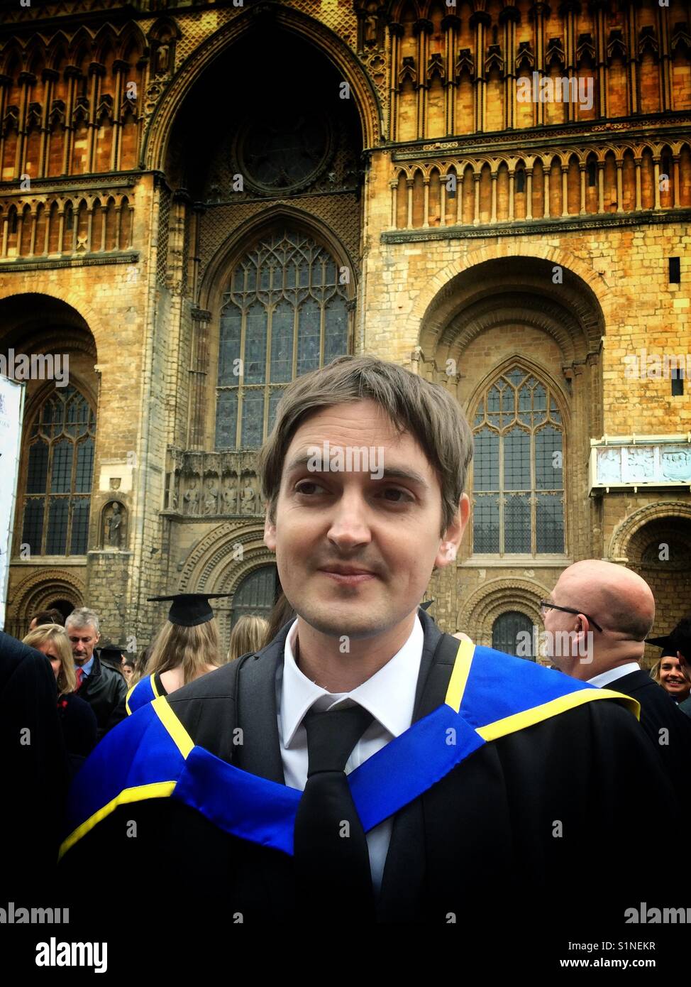 Graduate outside Lincoln Cathedral Stock Photo - Alamy