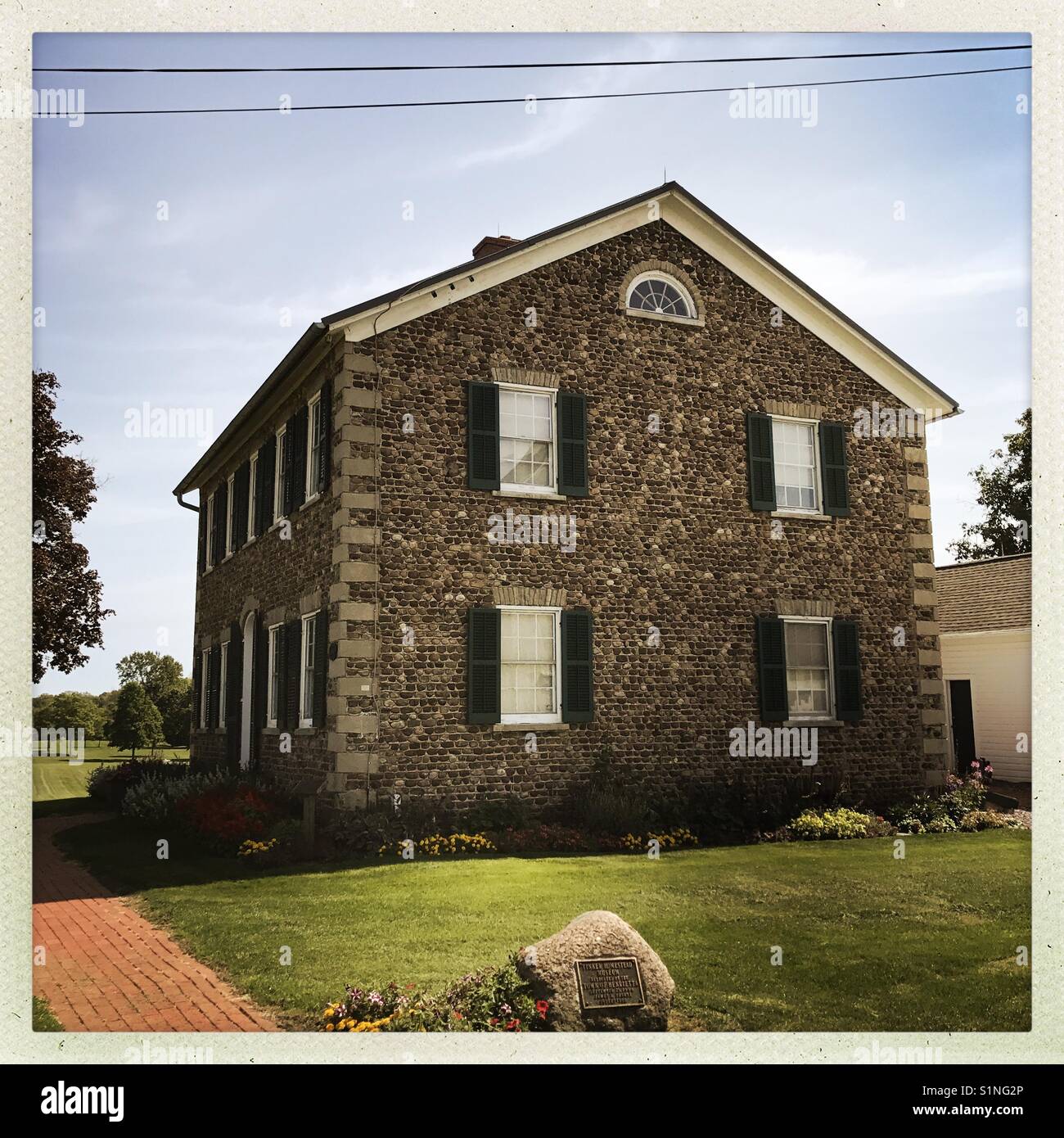 Historic Cobblestone home Stock Photo - Alamy