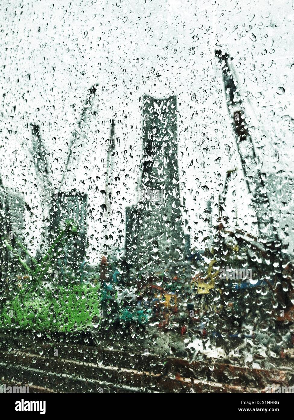 Construction in the rain Stock Photo - Alamy