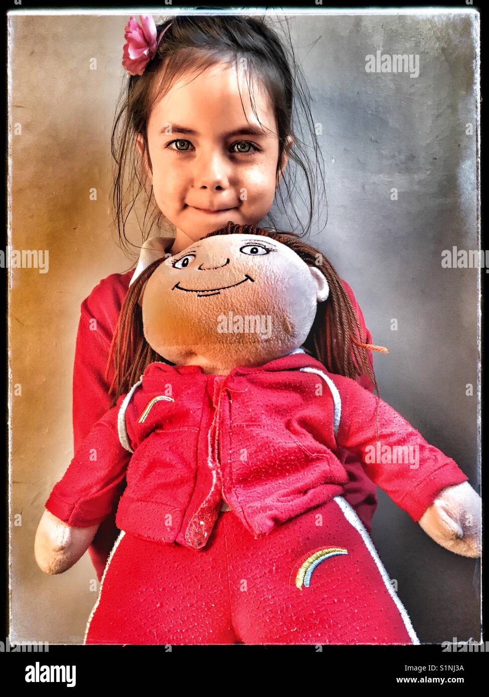 Child with doll Stock Photo - Alamy