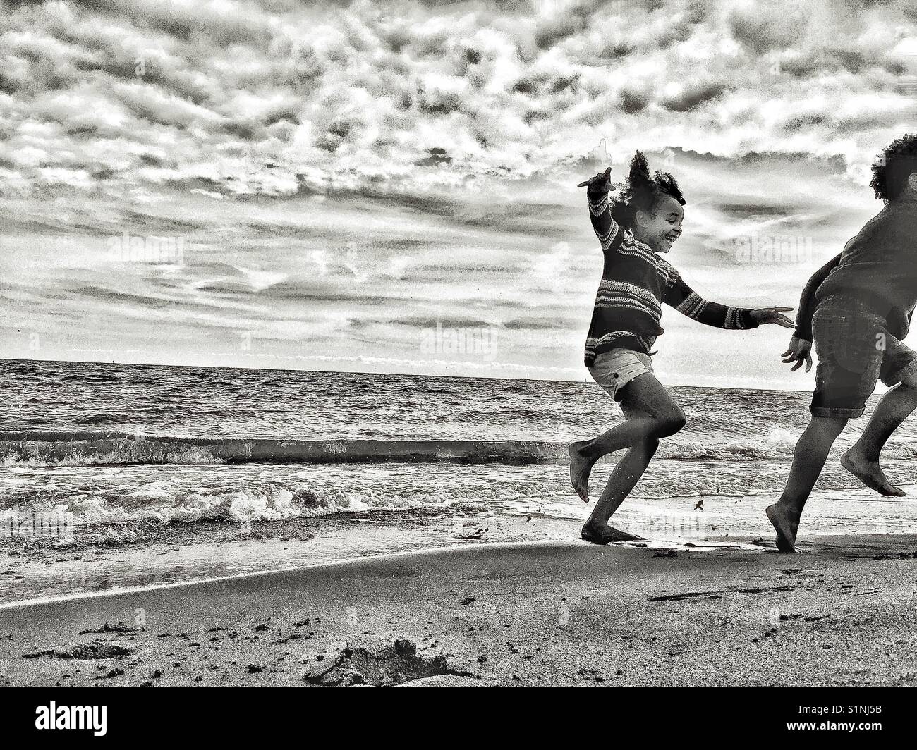 Fun at the beach Stock Photo - Alamy