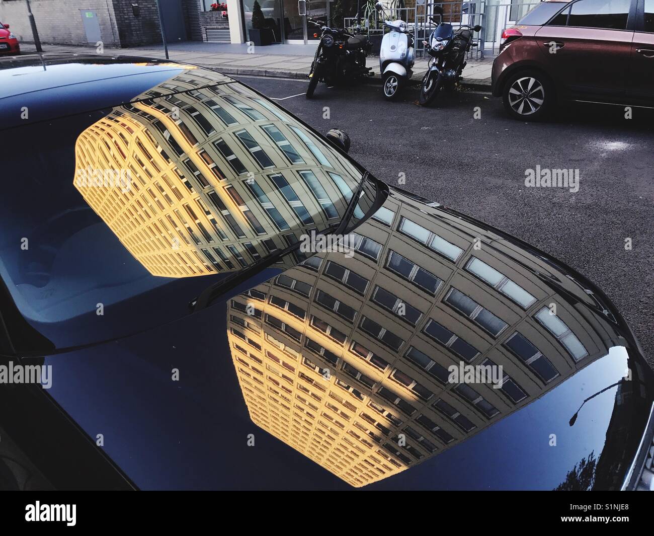 Car and reflection, South Park tower in London Stock Photo - Alamy