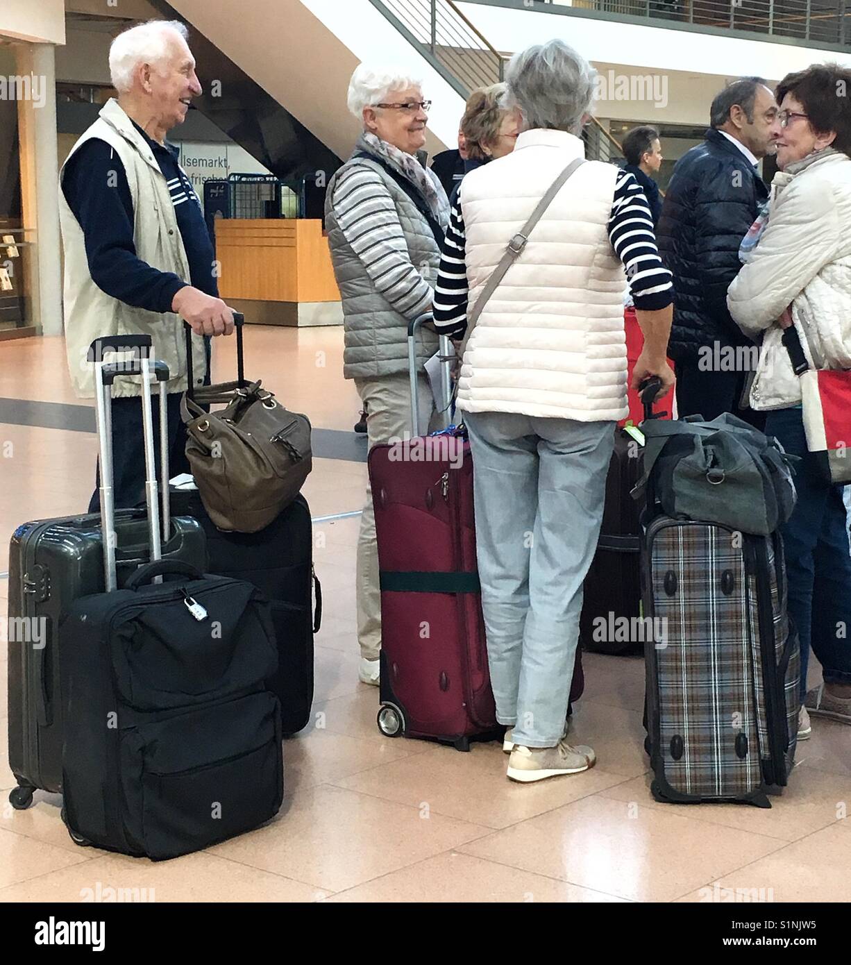 Eldery people airport hi-res stock photography and images - Alamy