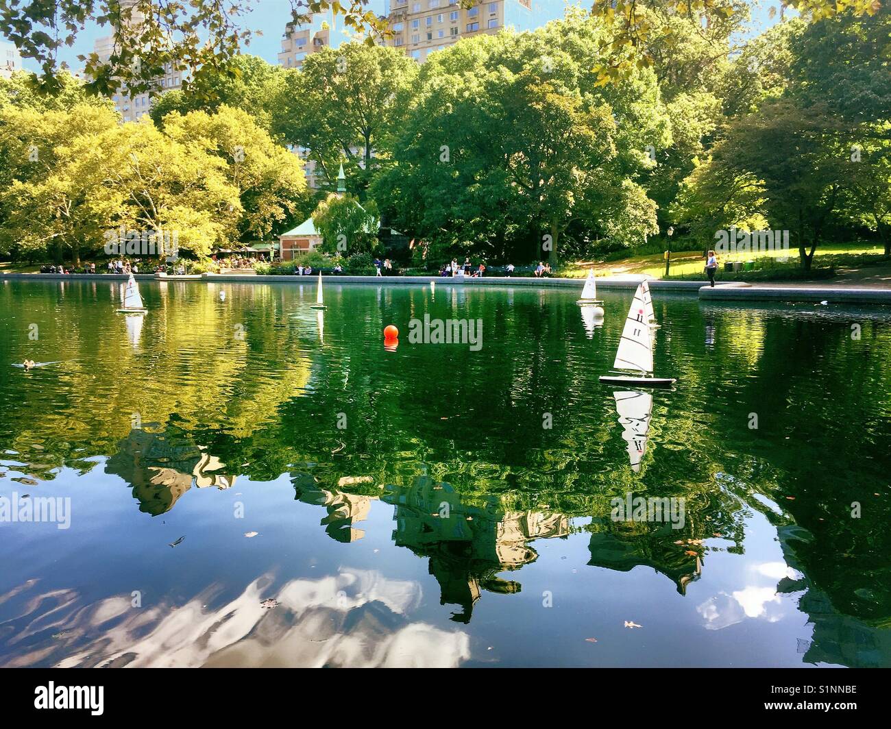 Peaceful scene of conservatory water, small boat pond, Central Park ...