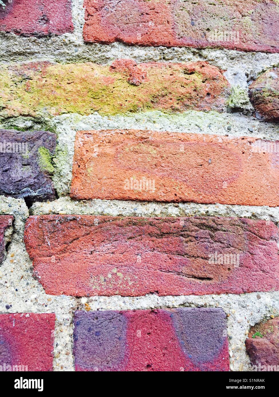 Colourful brick wall Stock Photo - Alamy