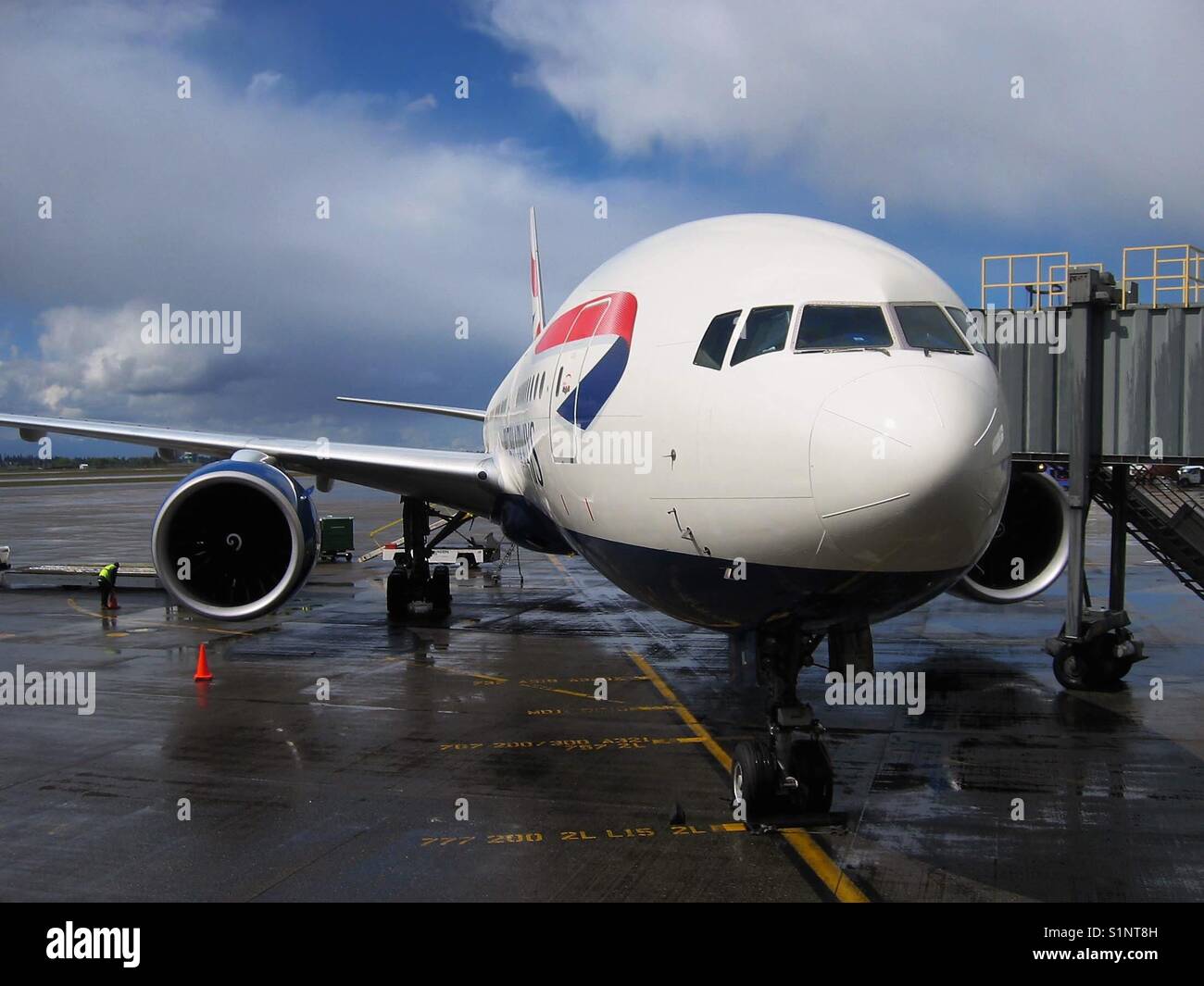British Airways Boeing 777 at an airport gate Stock Photo - Alamy
