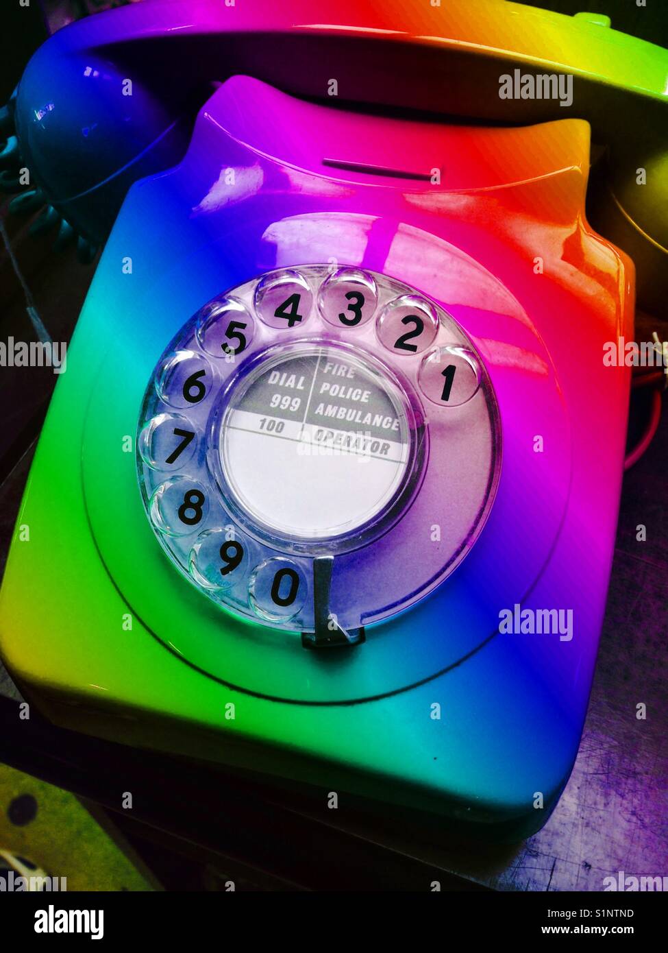 Retro telephone with rainbow colour overlay Stock Photo - Alamy