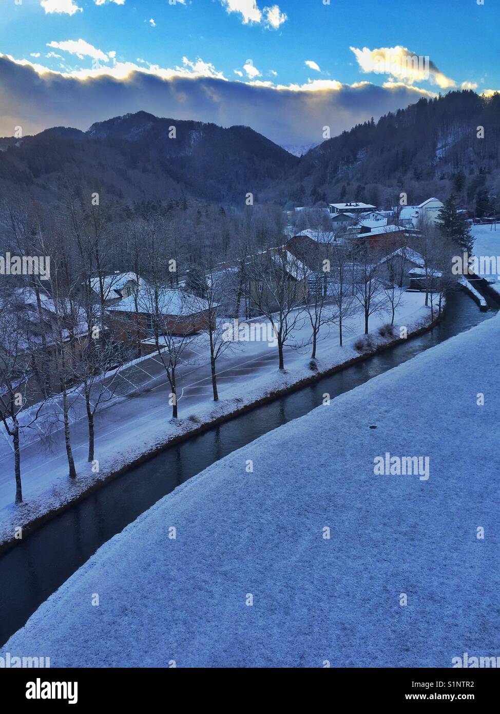 River in the snowy field Stock Photo - Alamy