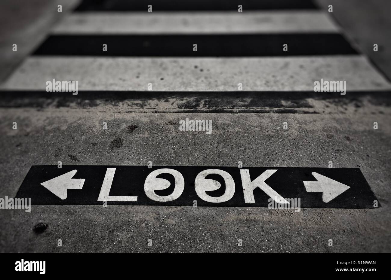 Look left road pedestrian sign hi-res stock photography and images - Alamy