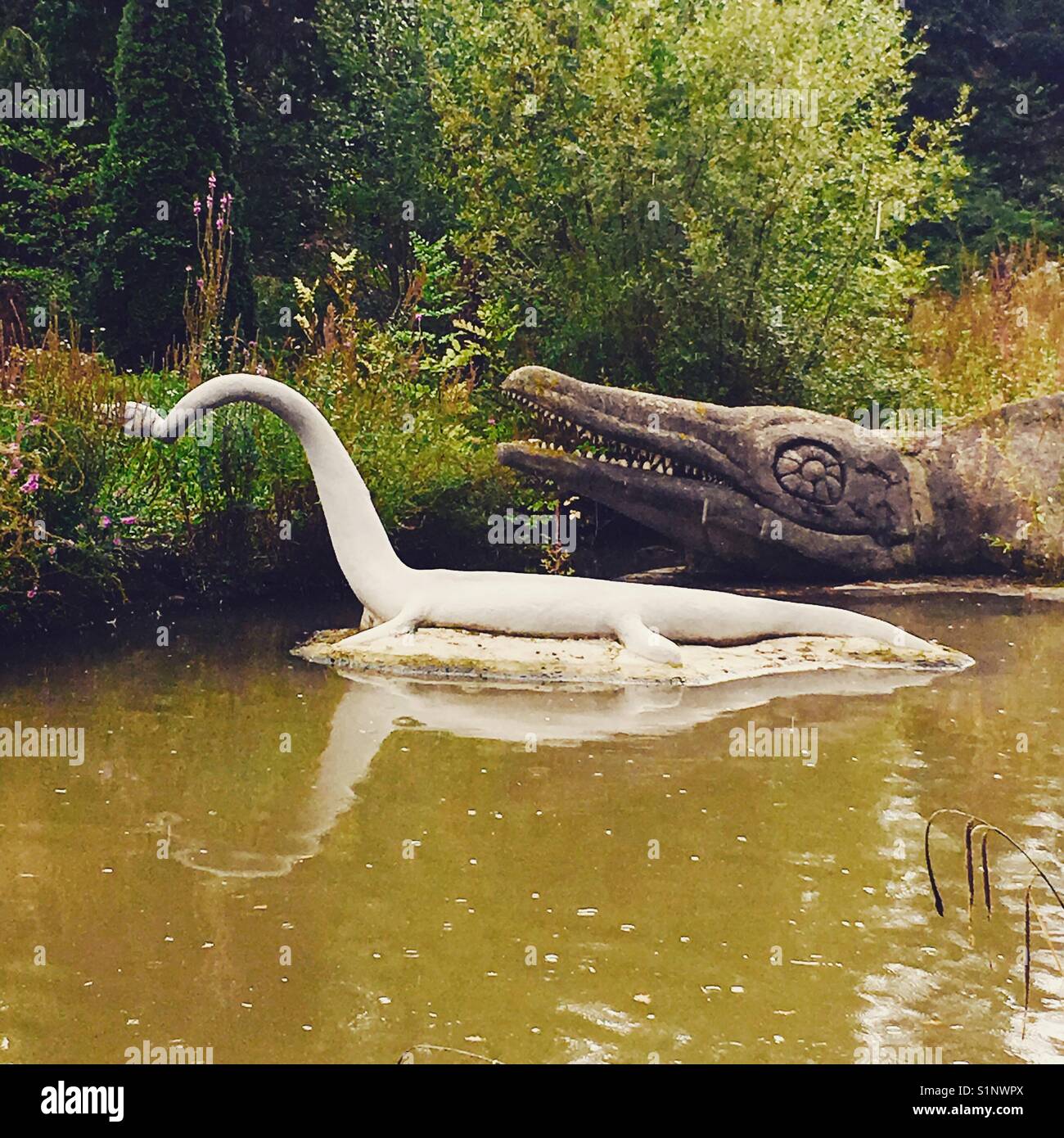 Stone dinosaurs in Crystal Palace Stock Photo - Alamy