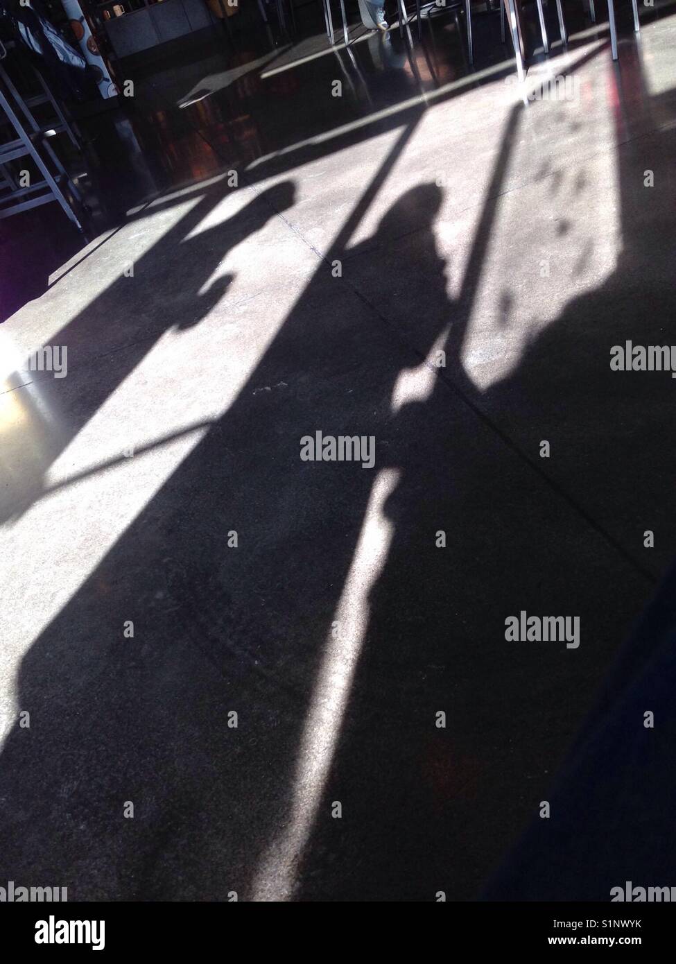 Two people enter hi-res stock photography and images - Alamy