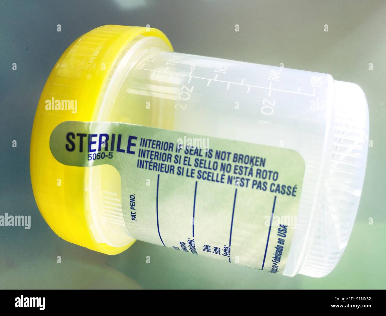 Unused and sealed sterile plastic urine sample container, USA Stock ...