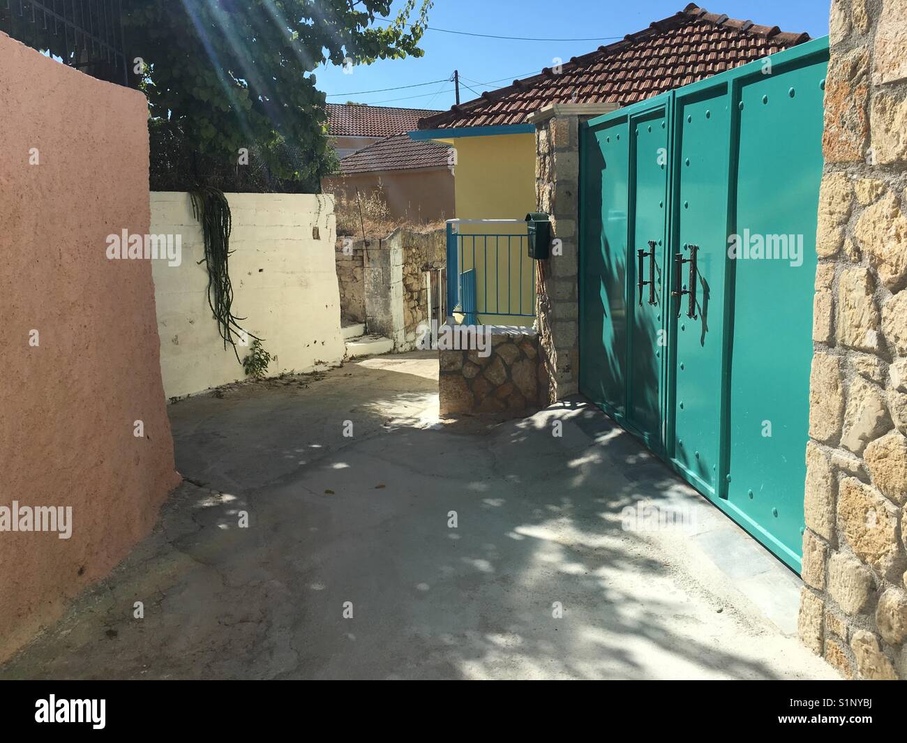A street in Kaligata on Kefalonia in Greece Stock Photo - Alamy