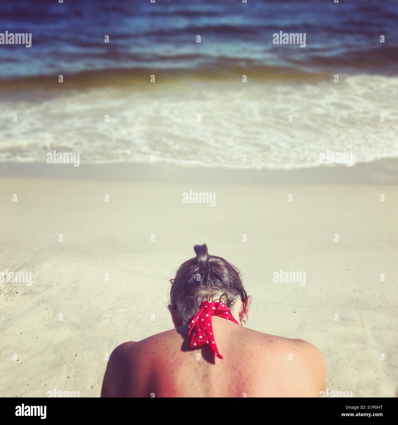Woman at ocean edge Stock Photo - Alamy