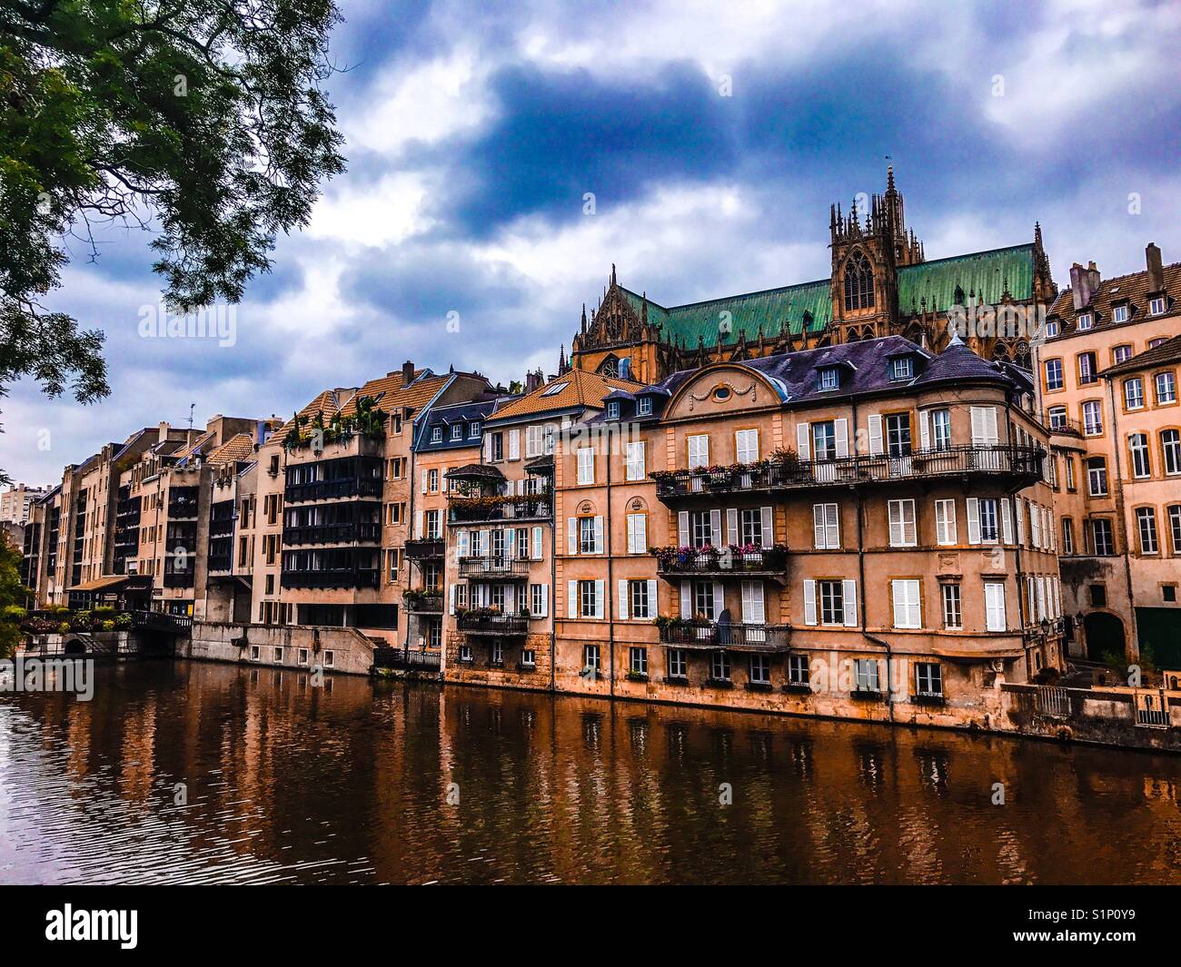 Residential houses and cathedral of Reims seen in background, France ...