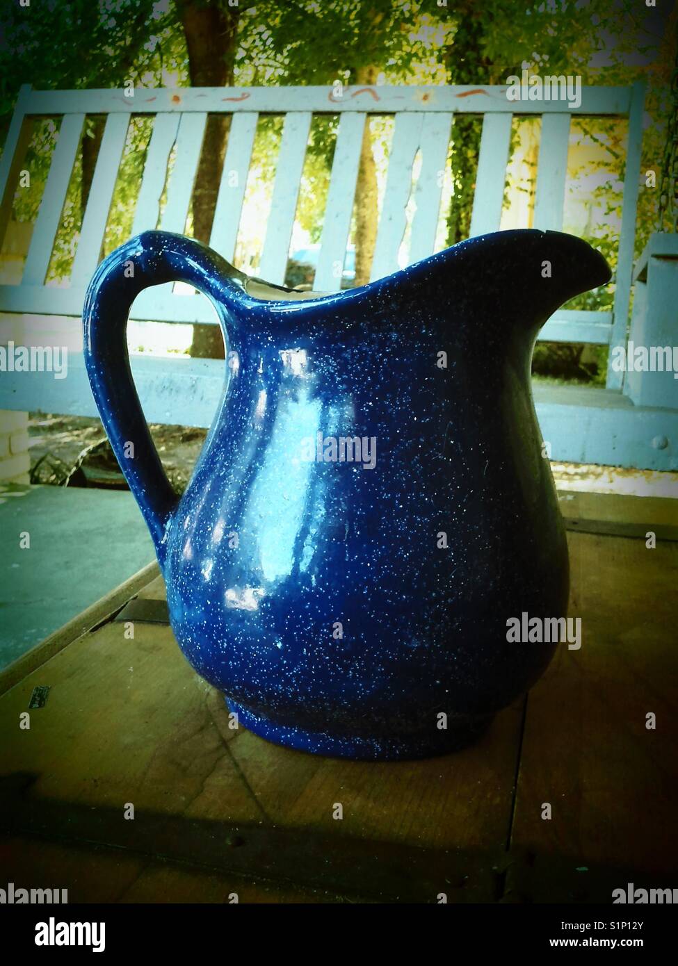 Blue water pitcher Stock Photo - Alamy