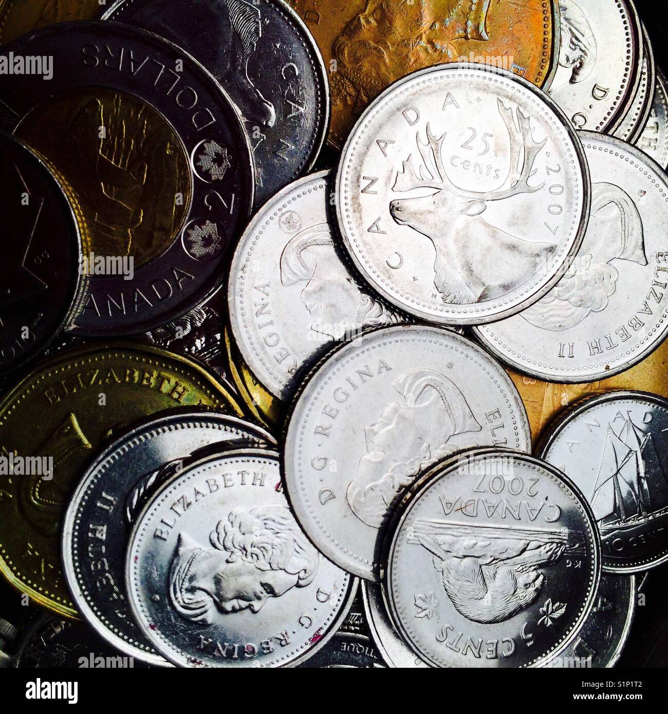 Canadian loonie and toonie hi-res stock photography and images - Alamy