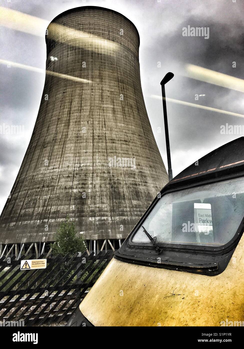 Train and Power Station from train window Stock Photo - Alamy
