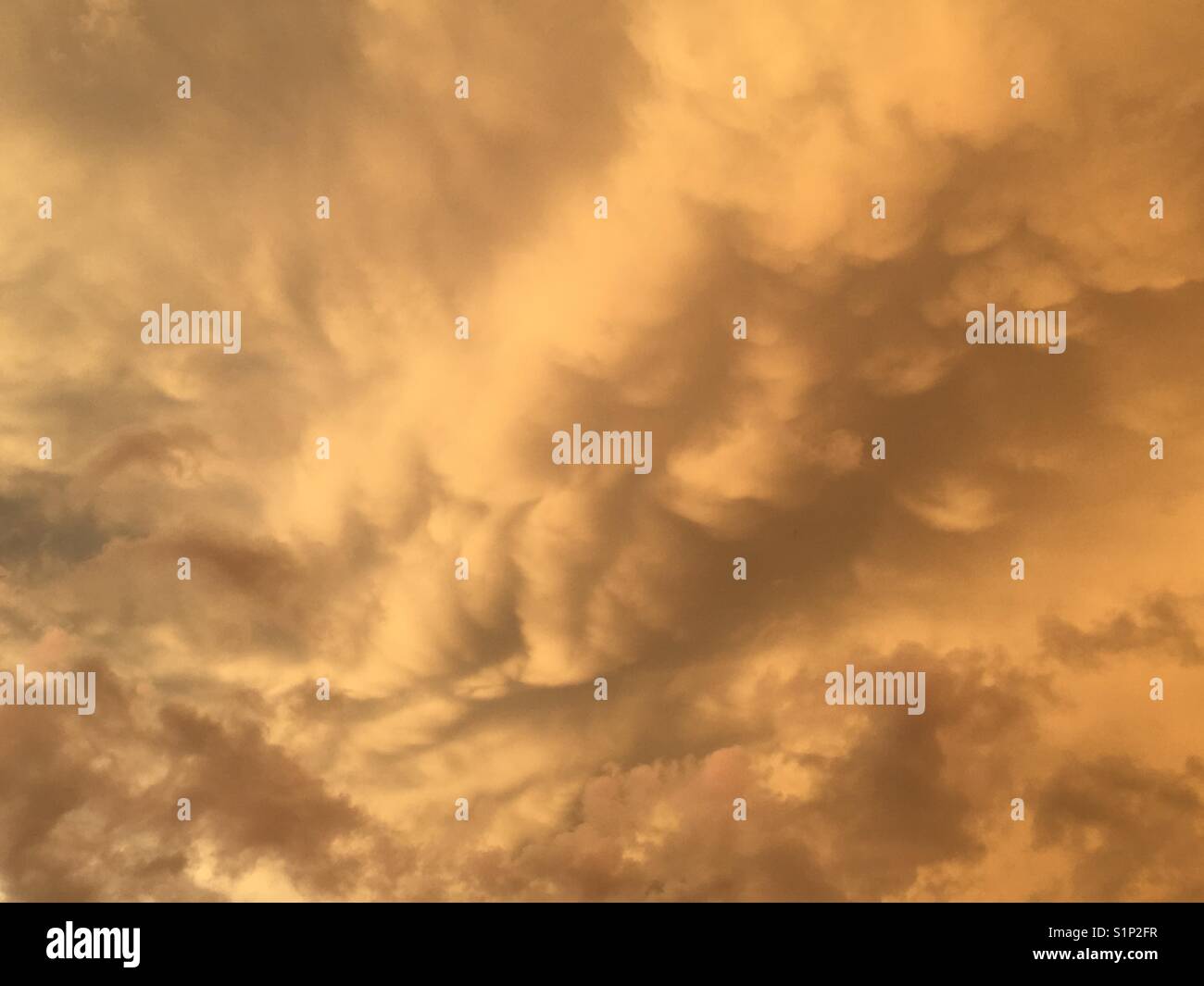Golden clouds hi-res stock photography and images - Alamy