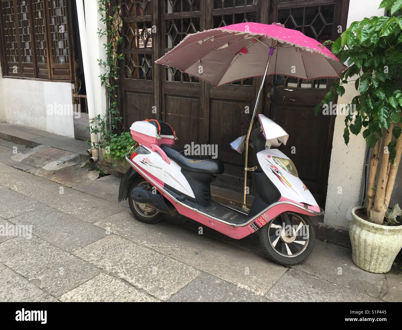 Pink moped hi-res stock photography and images - Alamy