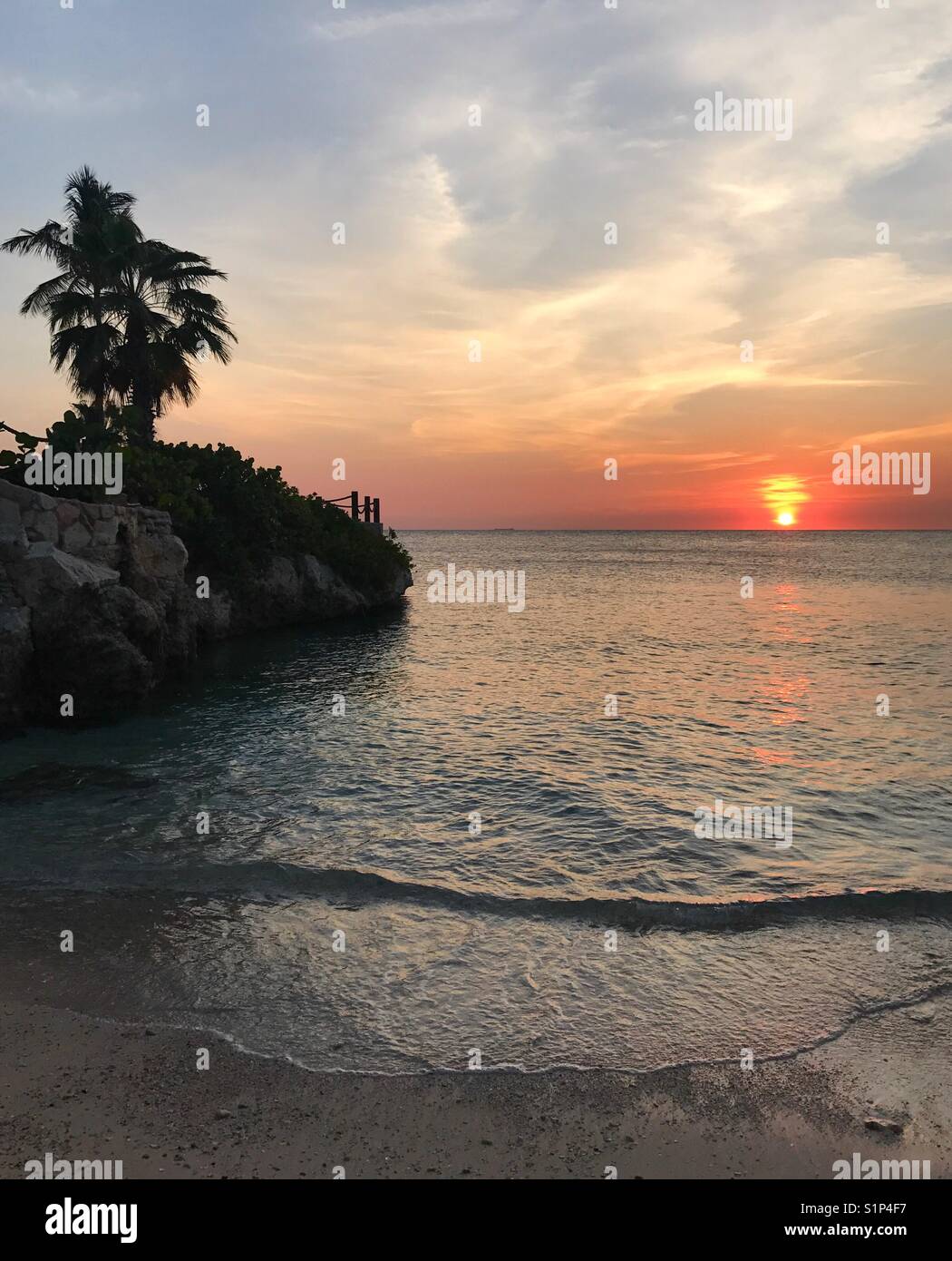 Sunset in Caribbean Stock Photo - Alamy