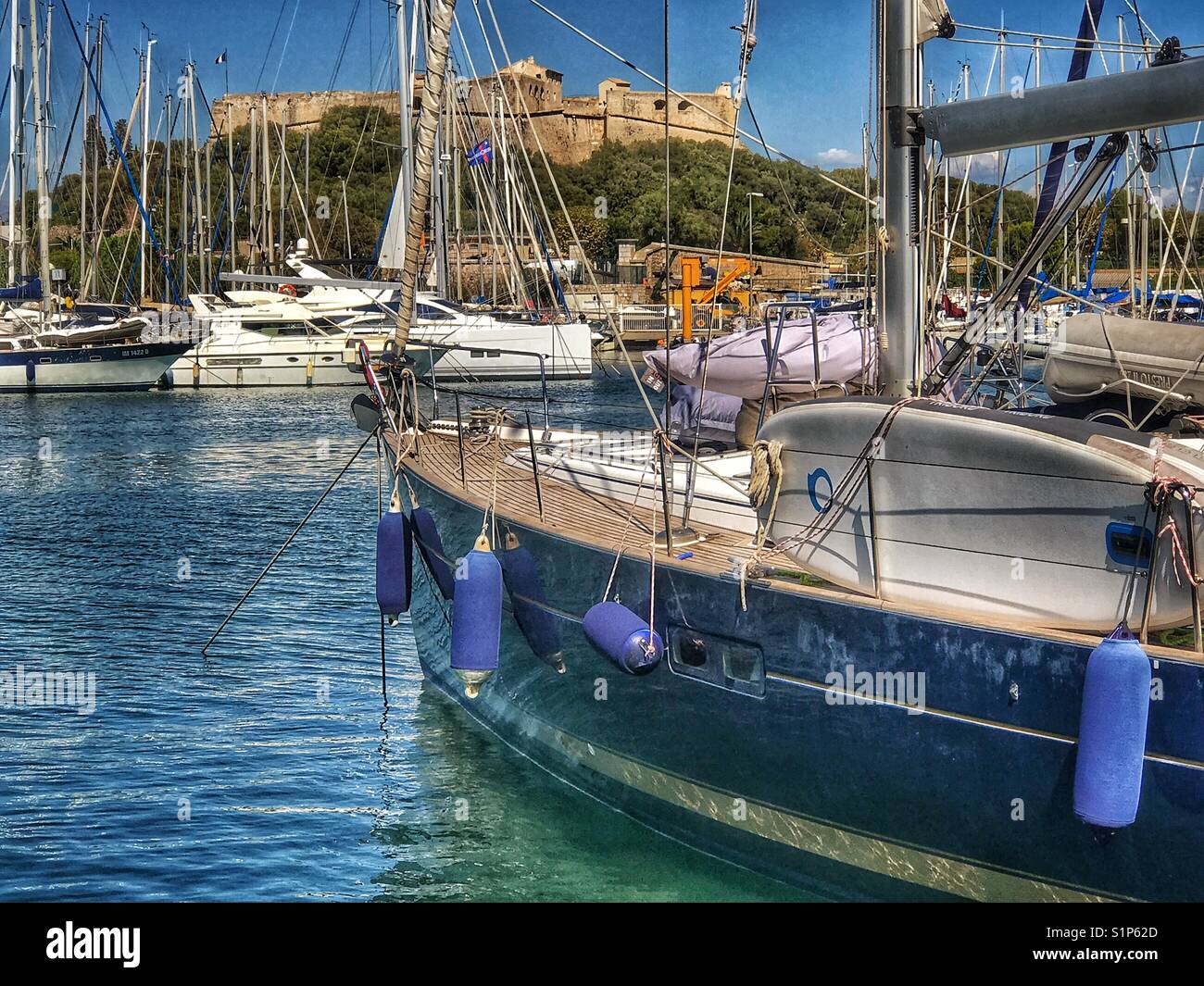 Harbour with medieval castle in the background Stock Photo - Alamy