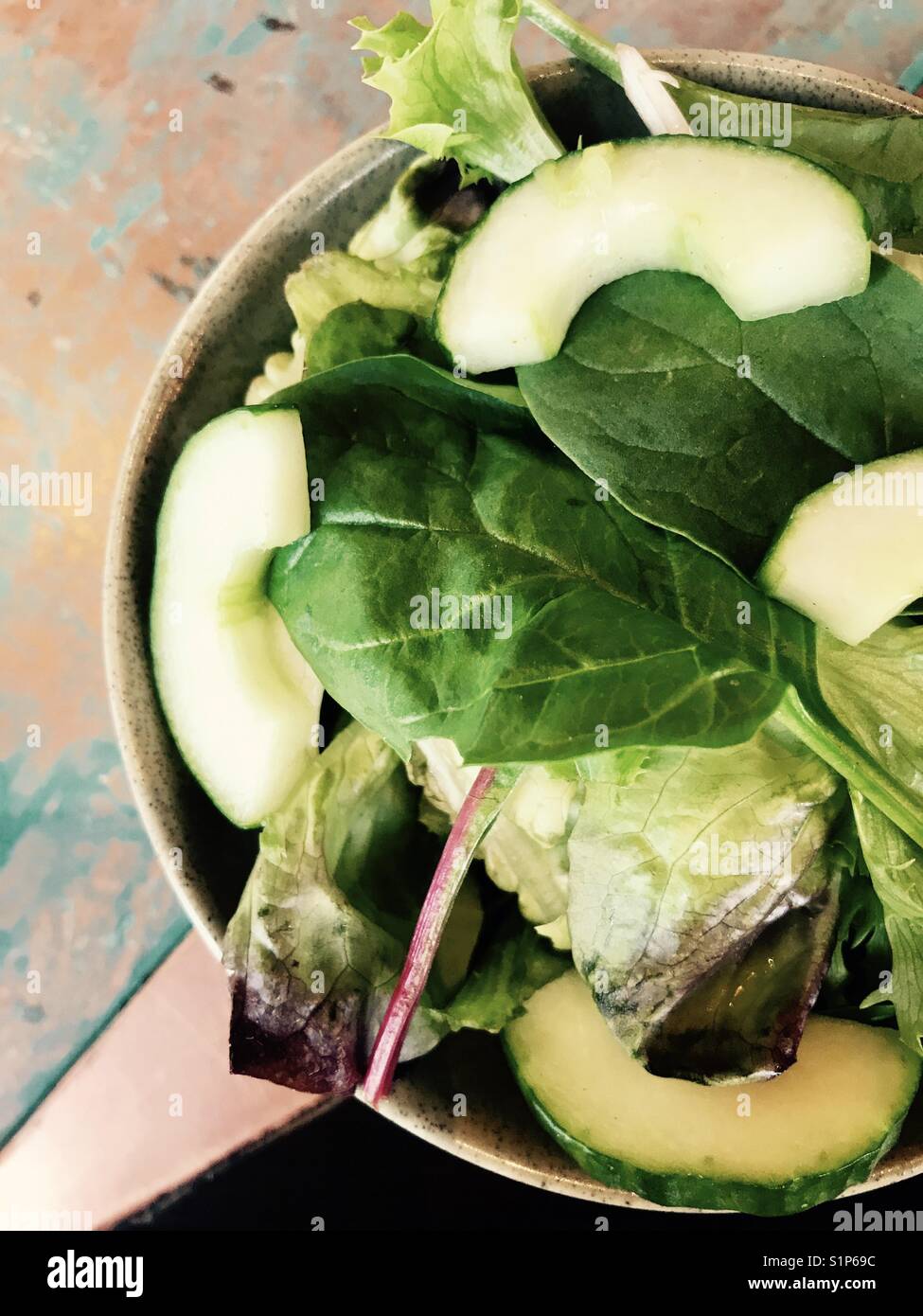 Mixed leaf salad on a old table Stock Photo - Alamy