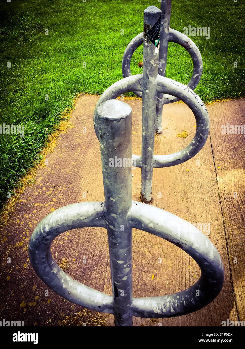 Three empty bike stands Stock Photo - Alamy