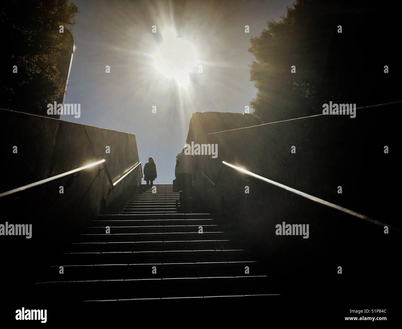 People emerging from an underground station into the daylight Stock ...