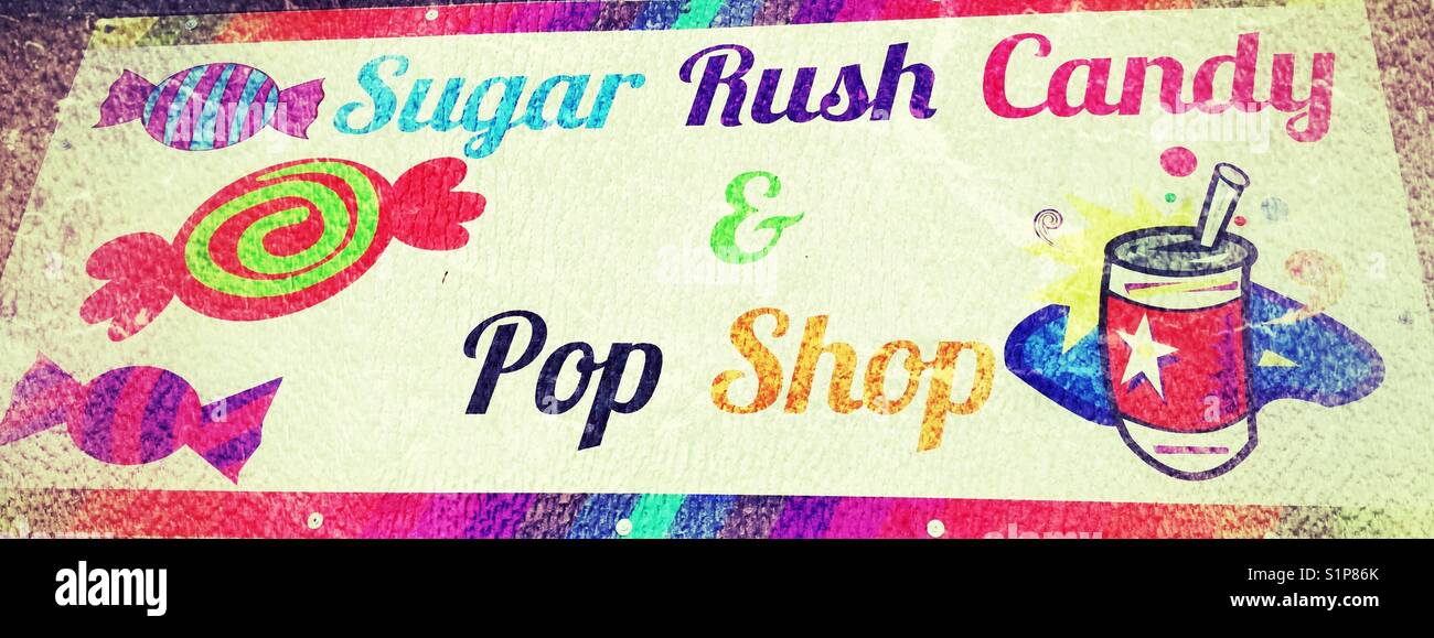 Colourful candy shop sign Stock Photo - Alamy