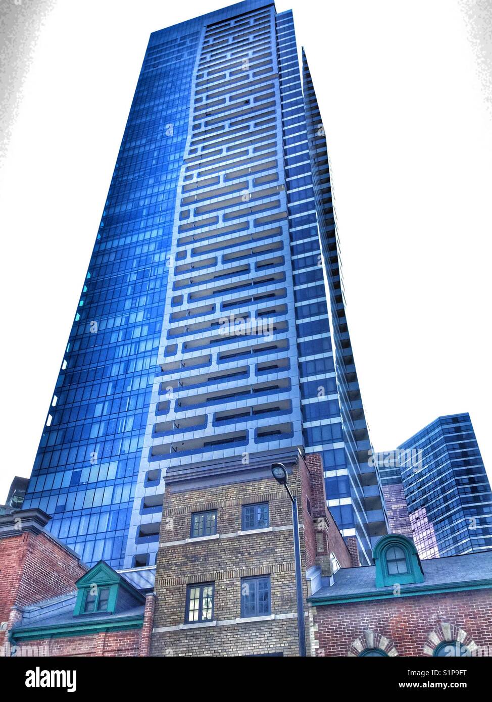 Modern architecture meets historic building Stock Photo - Alamy