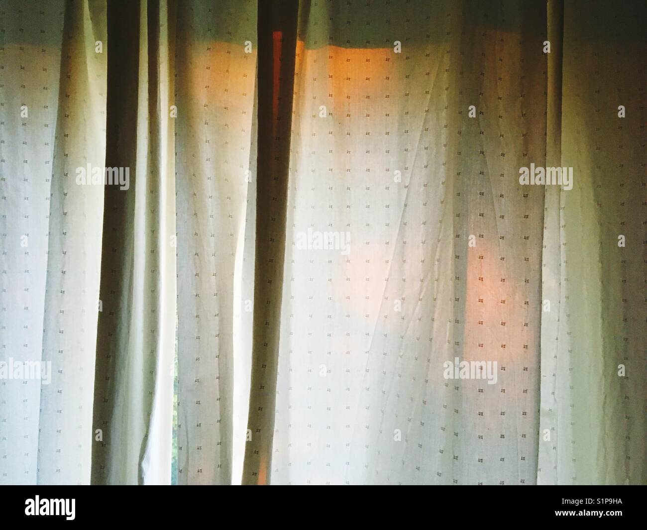 Sunrise through white textured sheer curtains Stock Photo - Alamy