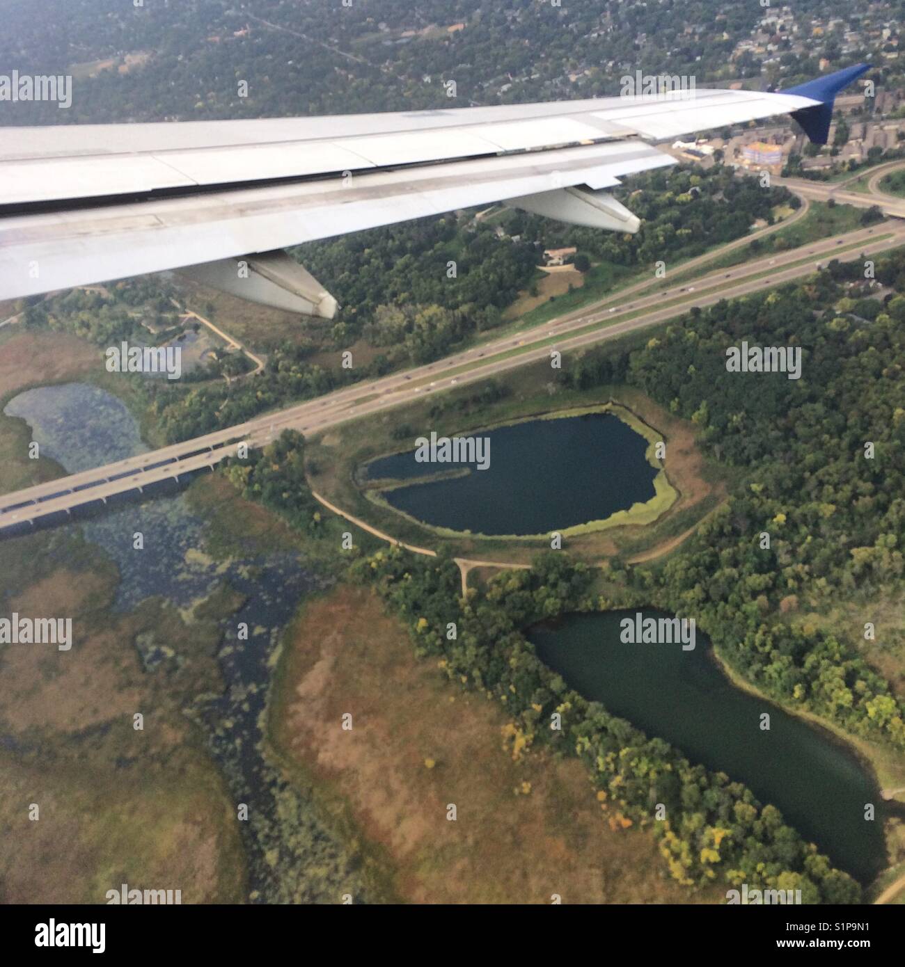 Flying over landscape and highways, United States Stock Photo - Alamy