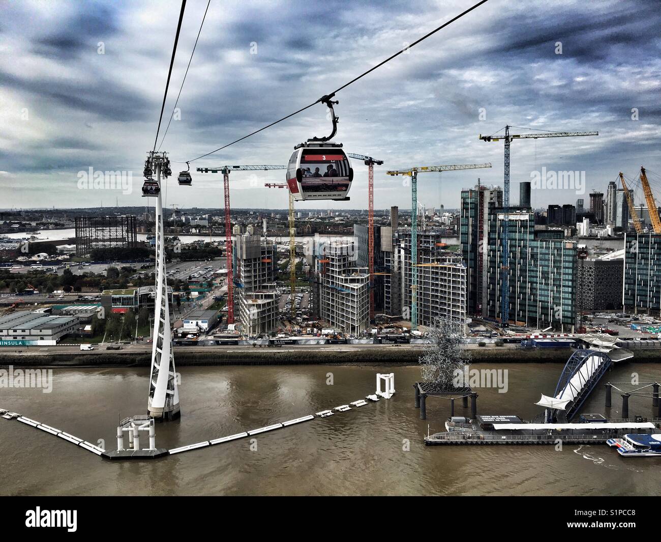 Emirates Air Line cable car over the River Thames, London Stock Photo ...