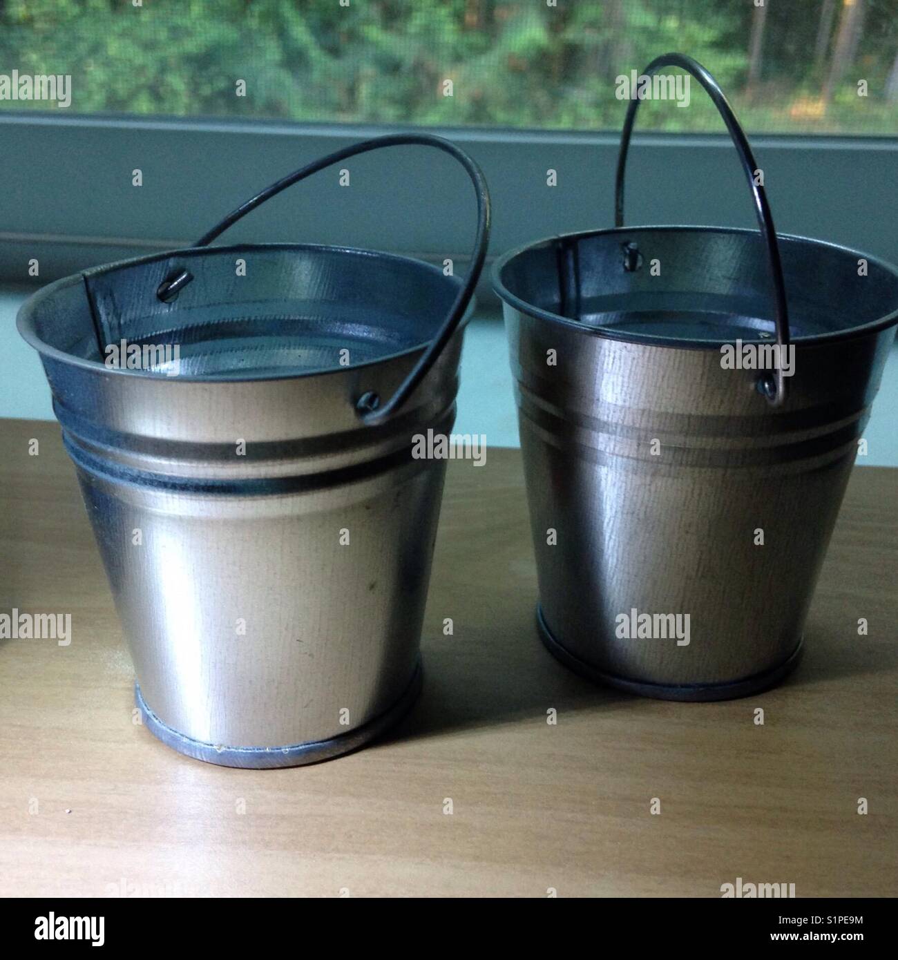 Two pails hi-res stock photography and images - Alamy