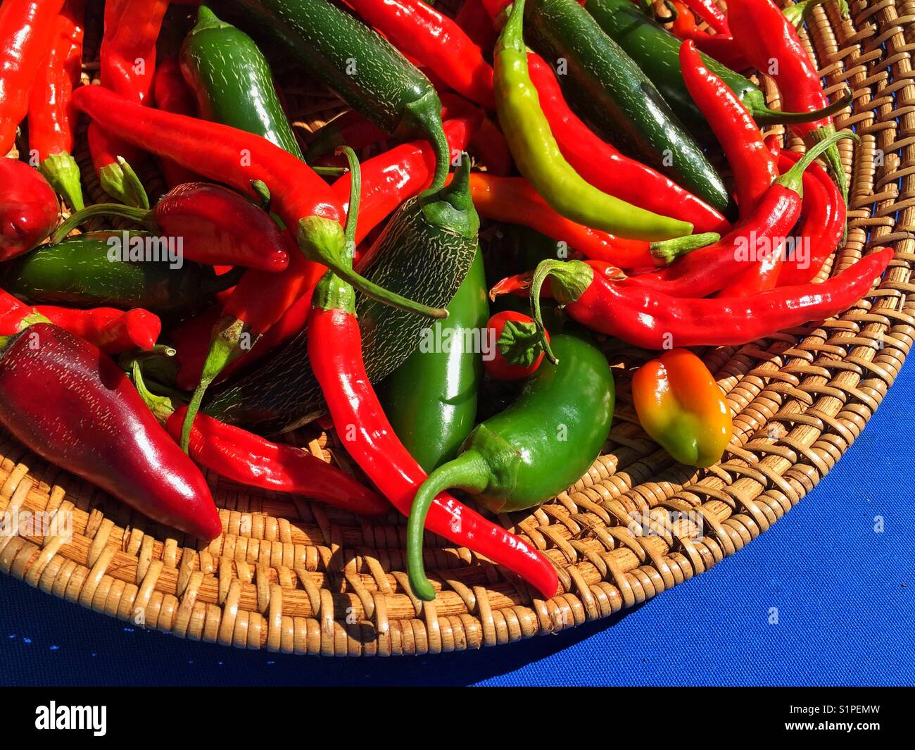 Peppers in a basket hi-res stock photography and images - Alamy